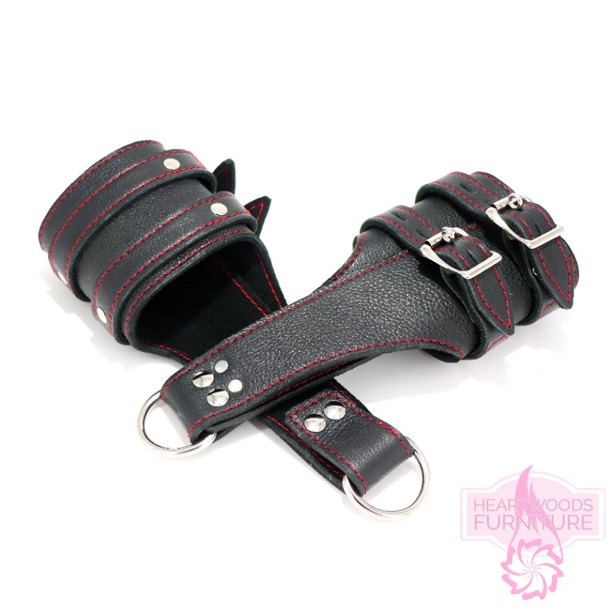 In-line vertical lockable wrist cuffs, black with black lining and red ...